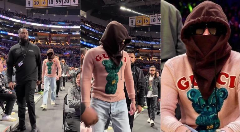 Cabeza tapada y lentes oscuros, así llegó Bad Bunny a juego de la NBA